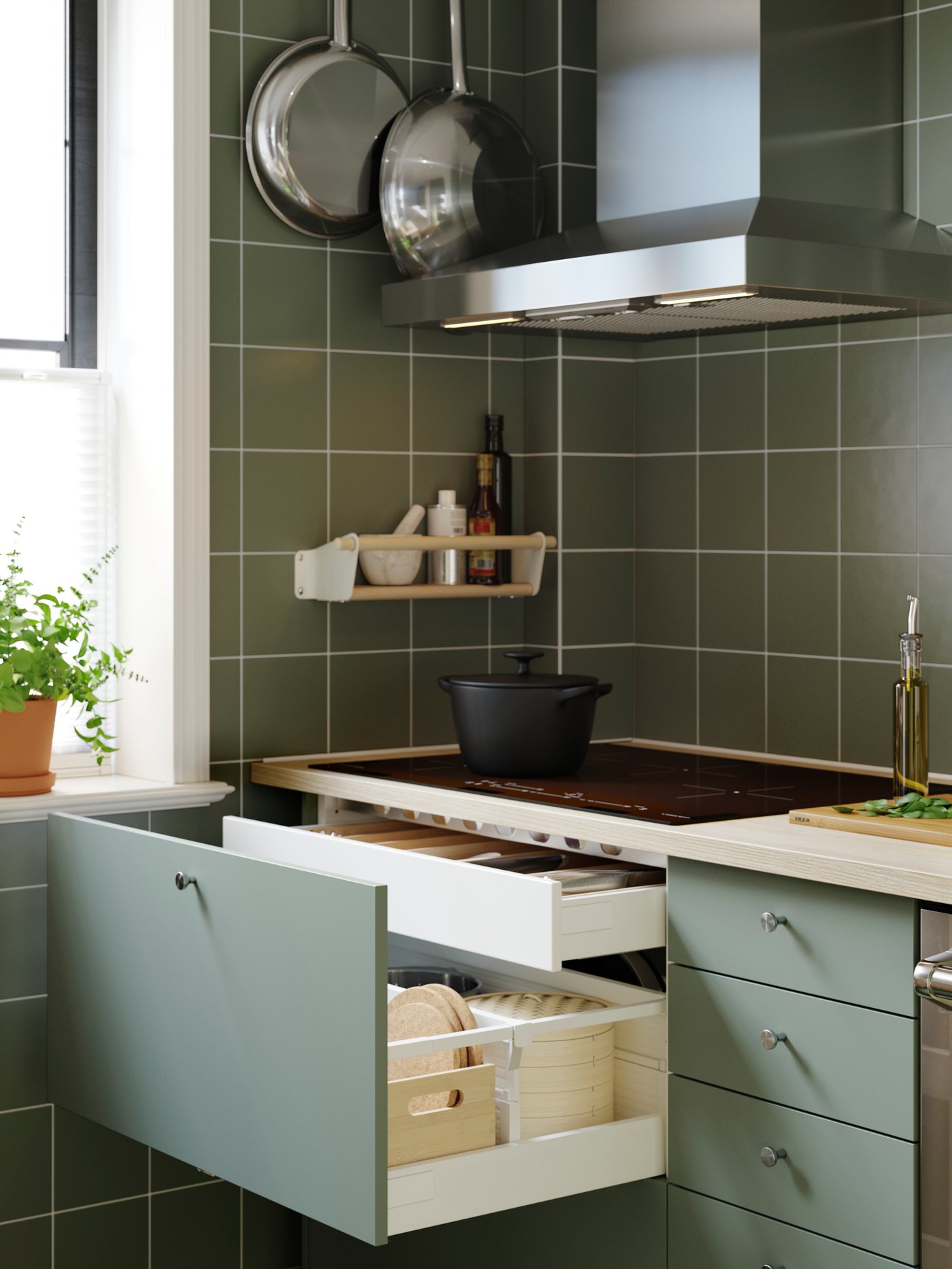 A sage green kitchen with NICKEBO fronts - IKEA