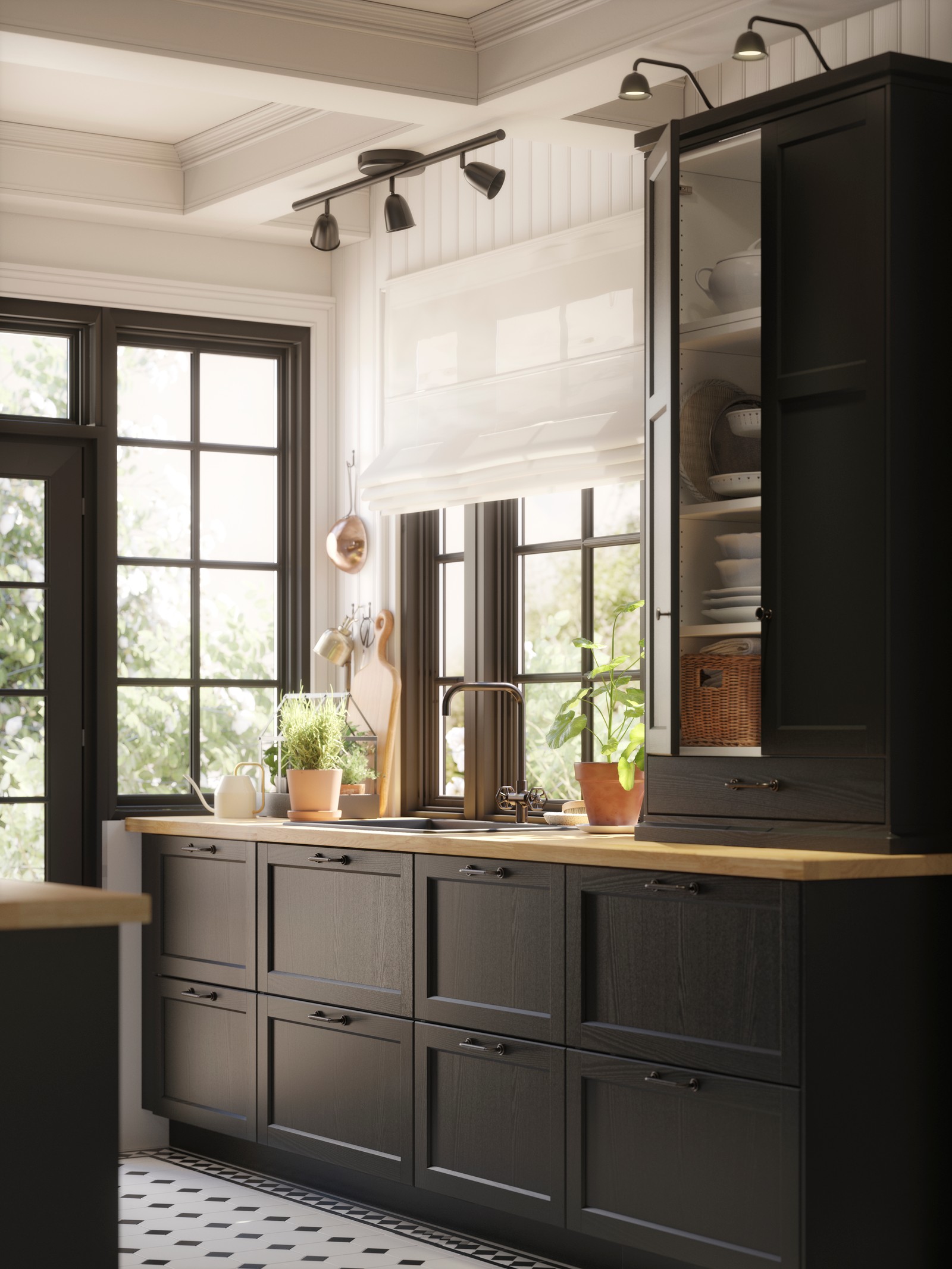 A traditional kitchen with black-stained fronts - IKEA