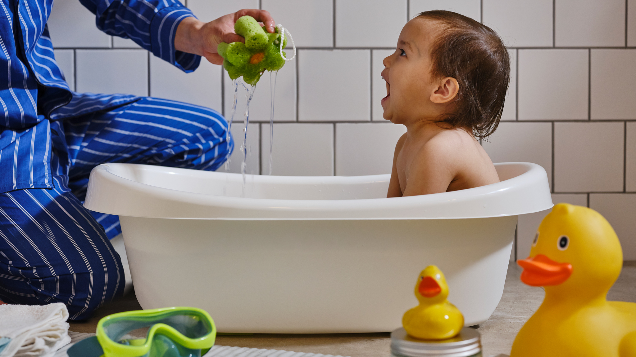 Child Taking A Bath