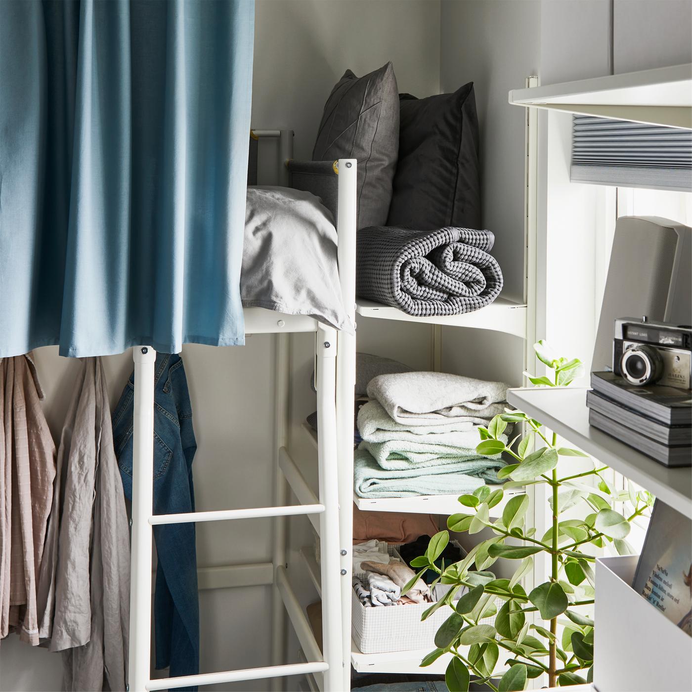 Vertical storage for an uncluttered small bedroom - IKEA
