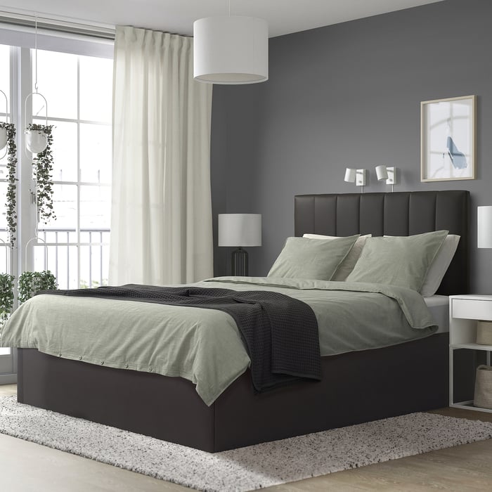 TJÅLLE upholstered ottoman bed, with headboard/Bomstad dark brown ...