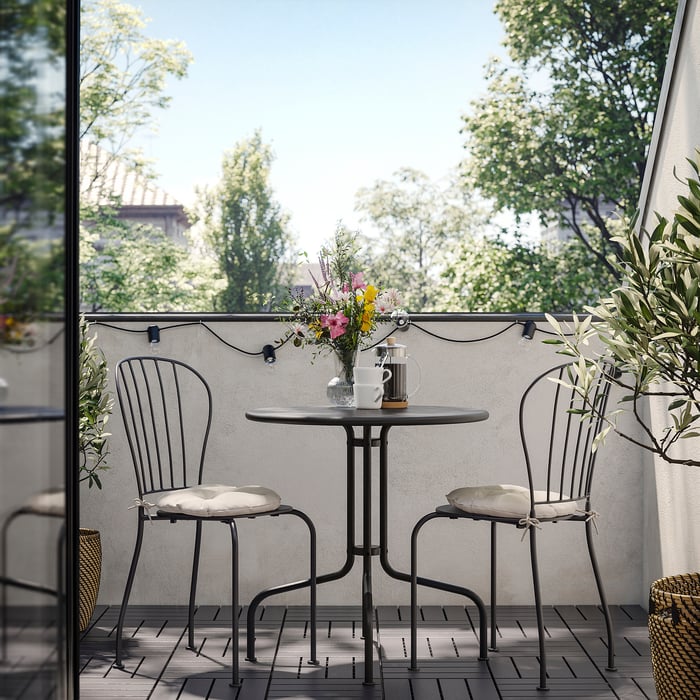 LÄCKÖ table+2 chairs, outdoor, gray/Kuddarna light gray-beige, 271/2 ...