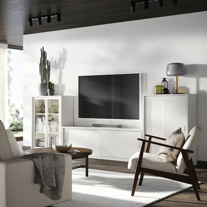 TONSTAD TV storage combo with sliding doors, off-white/clear glass ...